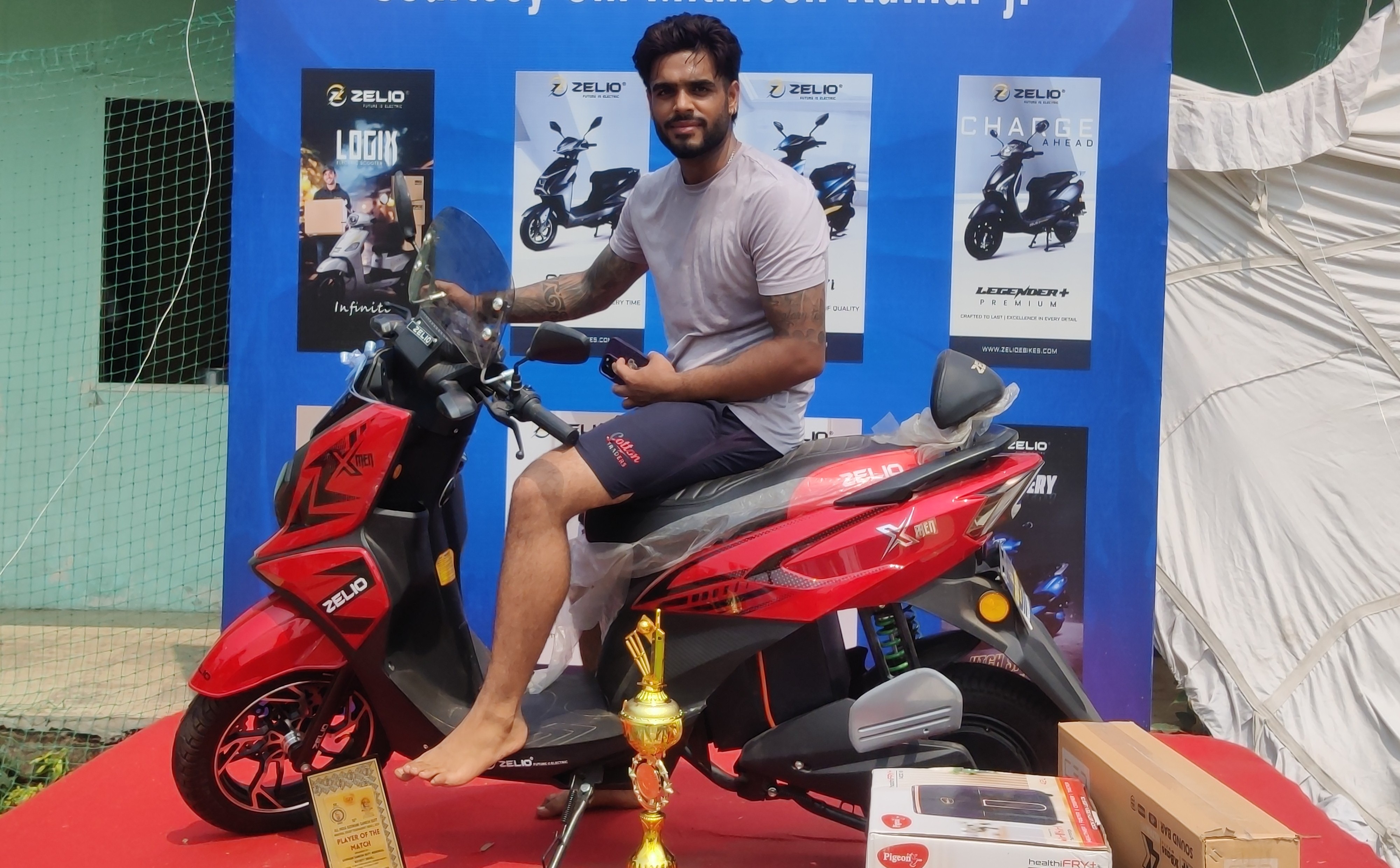 Samarth Seth zips to Zelio electric scooter with century as Collage ...